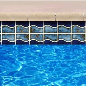 Wave Sea Cobalt Blue With Calacatta Gold Porcelain Lineup Border Pool ...
