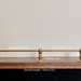 Unlacquered Brass Gallery Rail: Bookshelf Tipping Rail - Etsy Australia