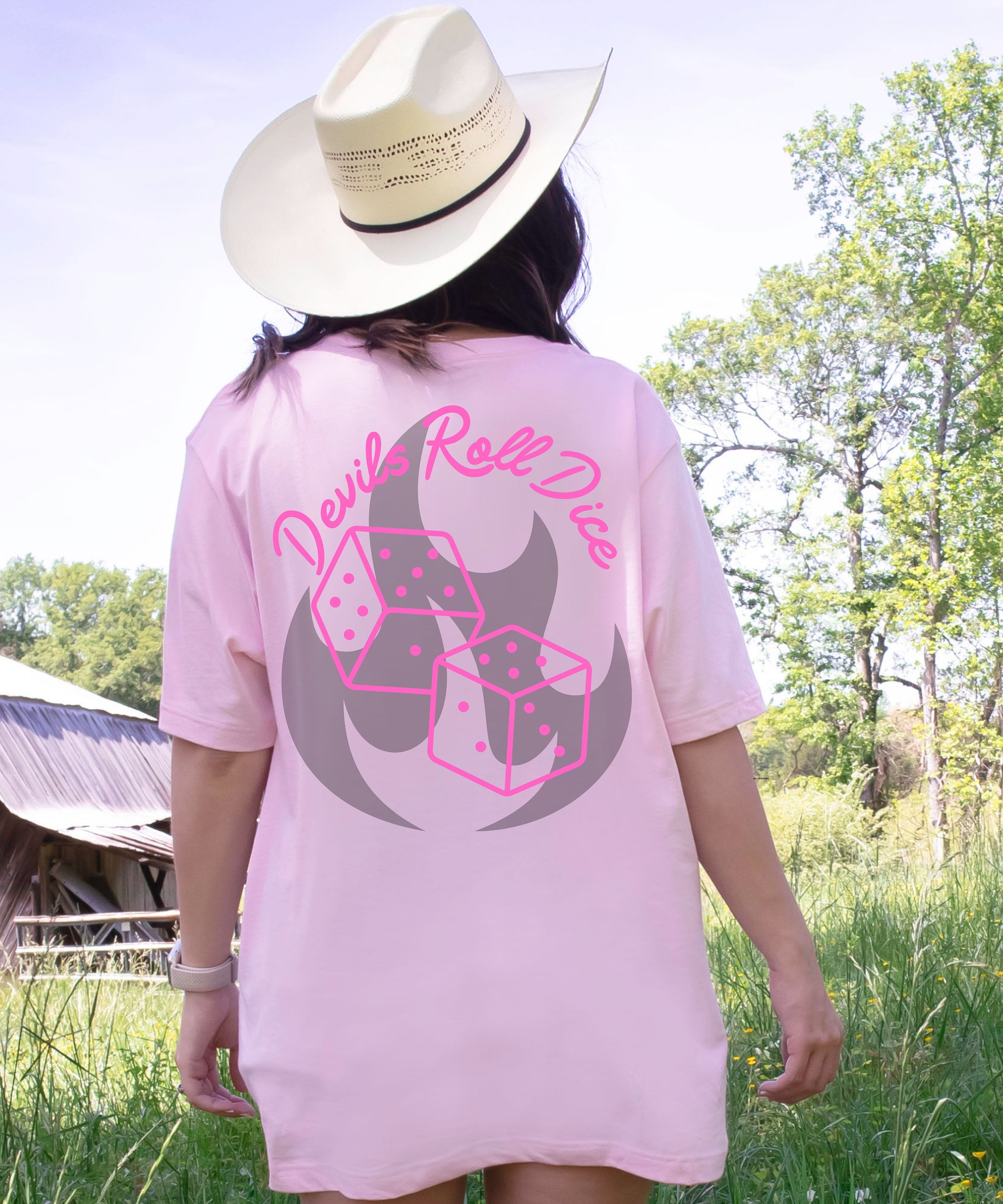 Angels roll their eyes / Devils roll dice pink graphic T-shirt sold by ...