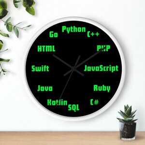 Geek Chic Wall Clock: Dramatic Black Timepiece Featuring Coding ...