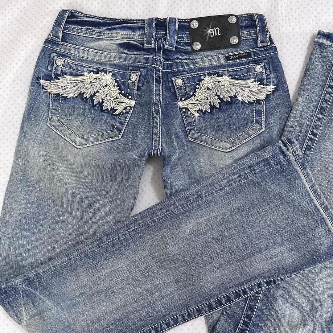 Miss Me 2000s Medium Wash Angel Wing Embellished Low-rise Bootcut Jeans ...