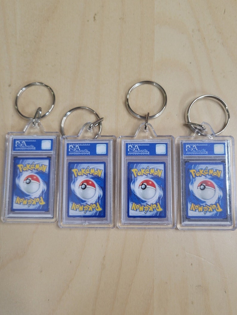 4 Peice Lot Keychain/keyring Charizard, Blastoise, Venusaur, Pikachu ...