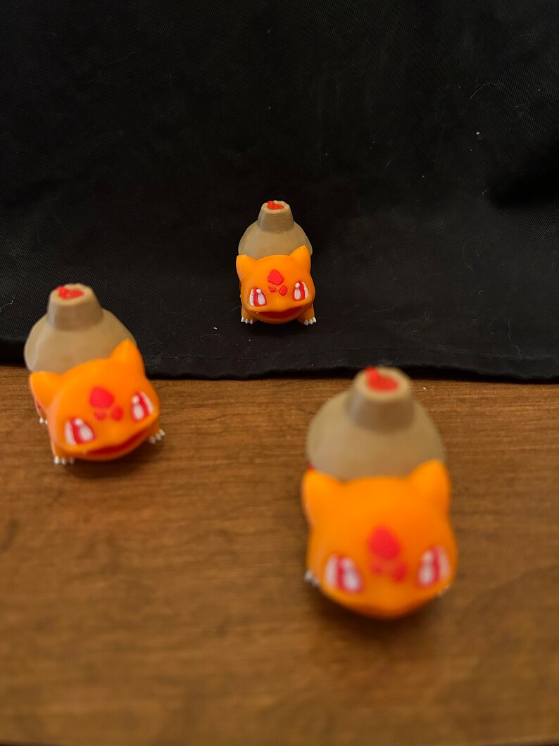 3D Printed Fire Type Bulbasaur Pokémon Sculpture: Ignited Charm in ...