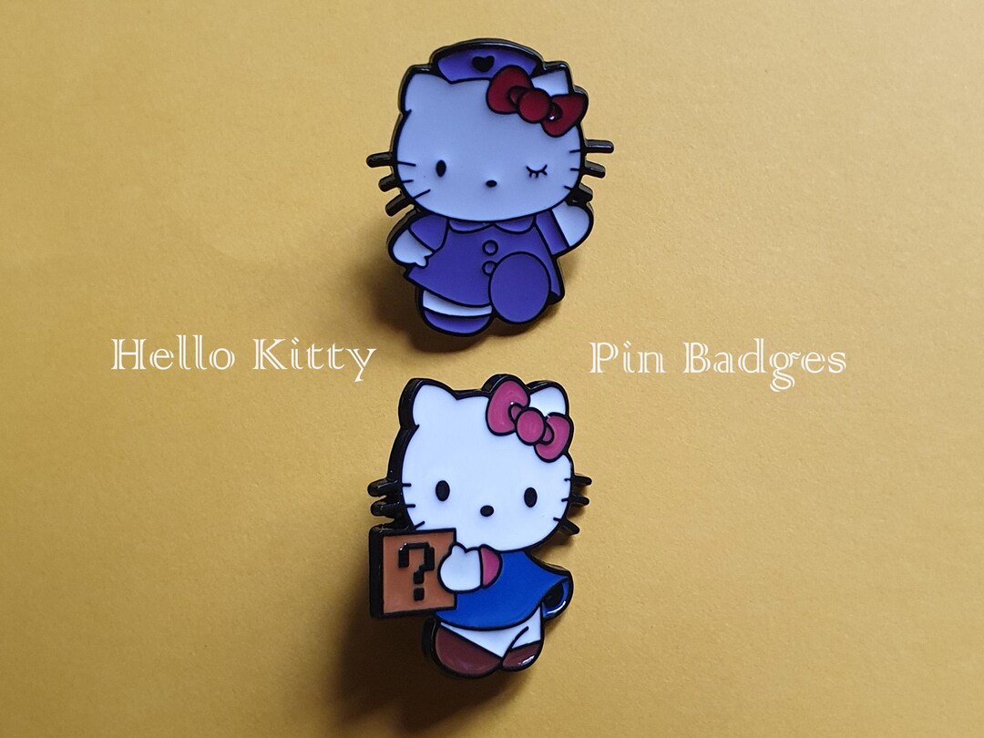 Hello Kitty Enamel 2 Pin Badges- Designs: Hello Kitty Reading Quiz Book ...