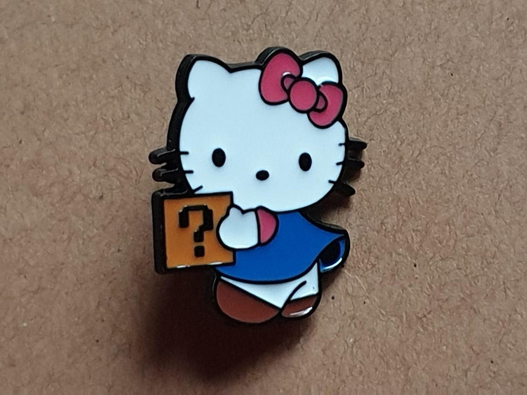 Hello Kitty Enamel Pin Badge- Hello Kitty Reading Quiz Book Design ...