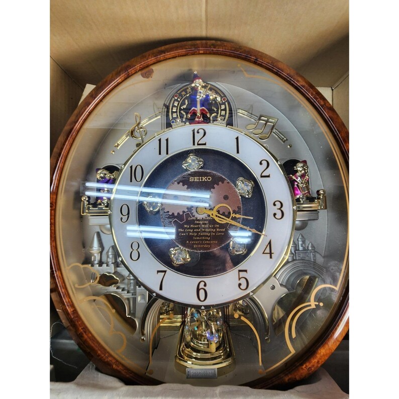 Seiko Swarovski Crystals Melodies in Motion Wall Clock QXM147BRH FOR ...