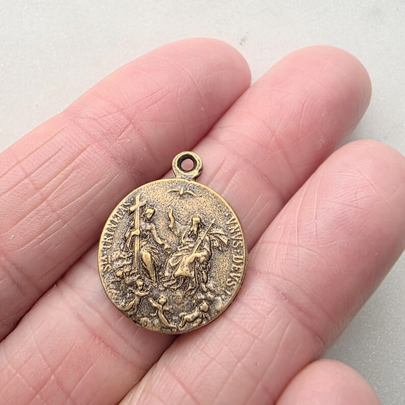 The True Bronze Holy Trinity Medal Details the Holy Spirit, Jesus ...