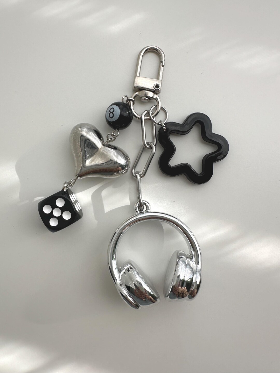 Silver Headphone Bag Charm With Heart & Black Die: Edgy, Modern, and ...