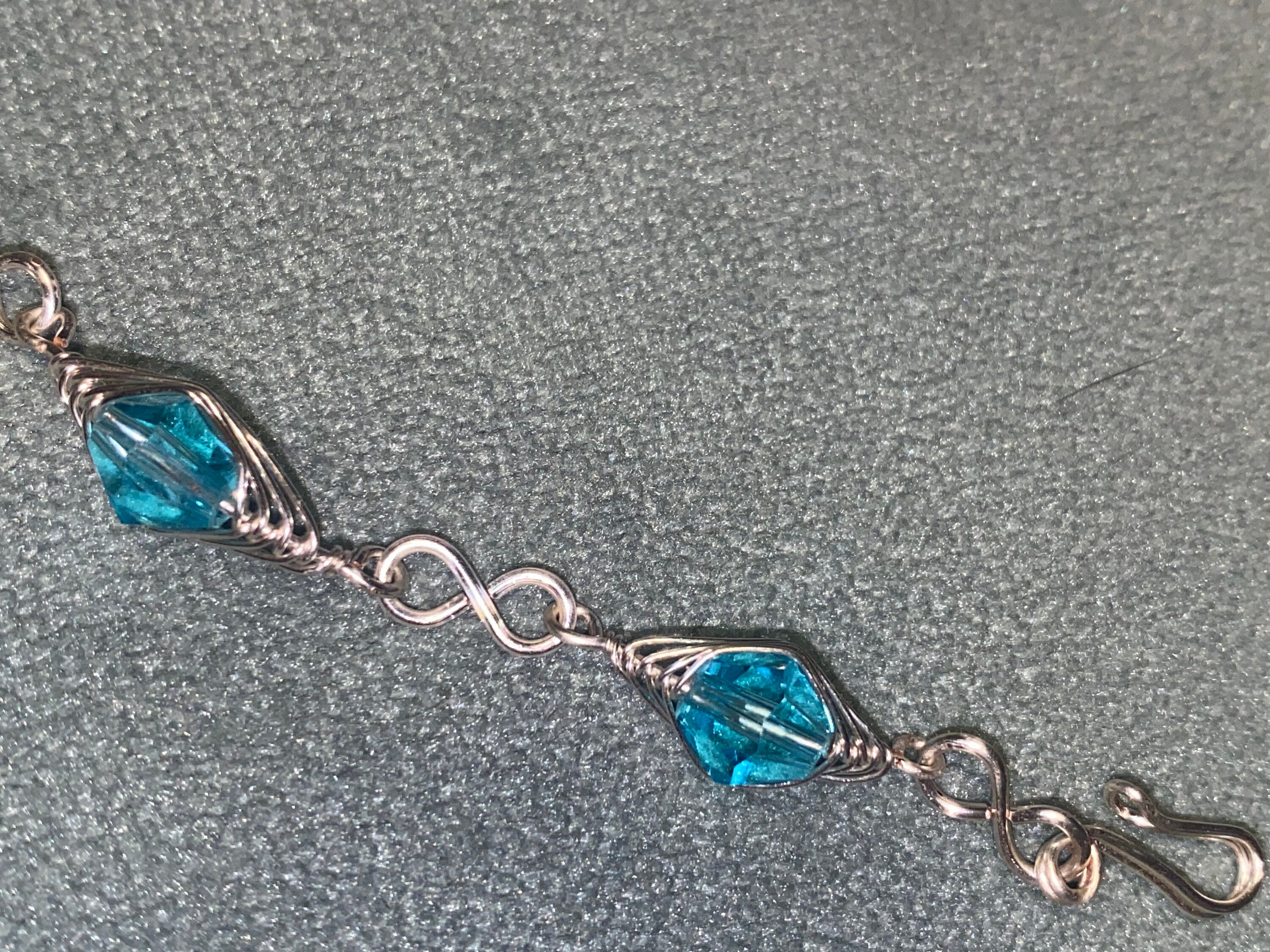 Wire-wrapped, Blue Topaz Colored Bi-cone Crystal Bracelet in Silver ...
