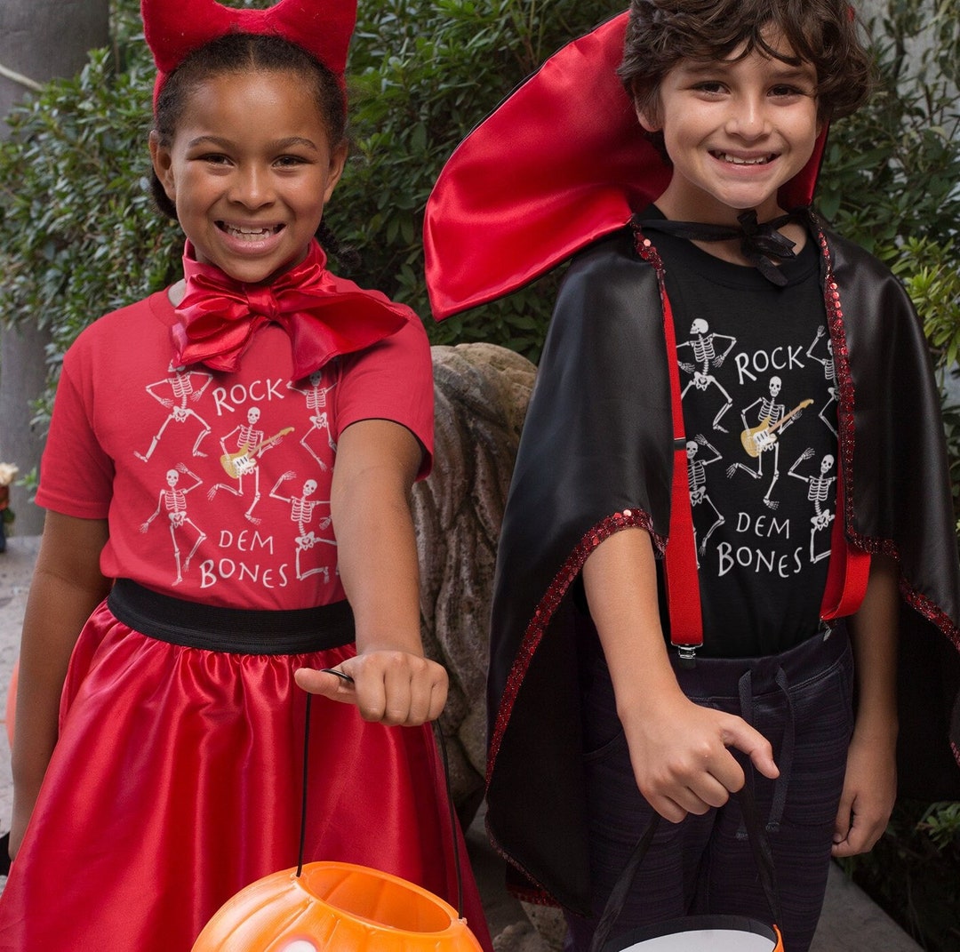 ROCK DEM BONES, Children's Dancing Skeletons T-shirt With Yellow Guitar ...