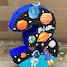 First Trip Around the World Pinata / Spaceship Piñata / Solar System ...