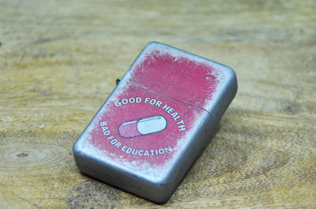 Flip Top Lighter in a Case With a Akira Pill - Good for Health Bad for ...