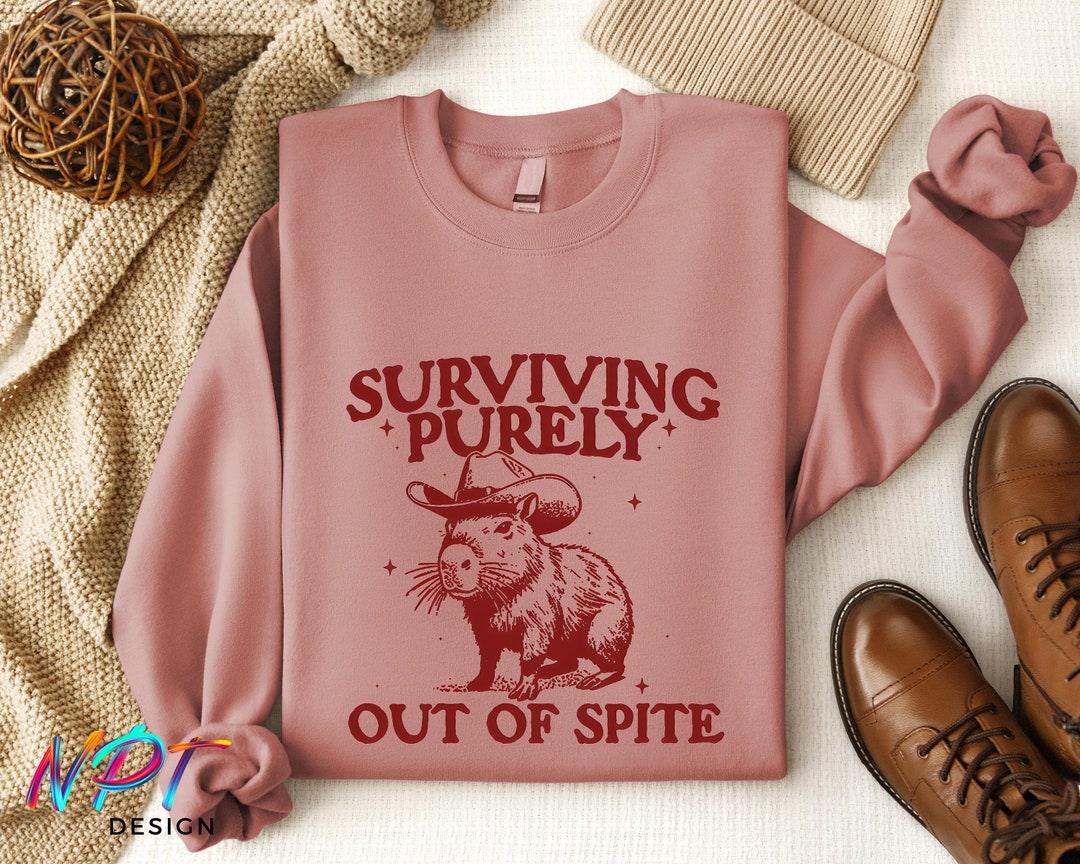 Hilarious Capybara Shirt, Surviving Purely Out of Spite Tee, Cozy ...