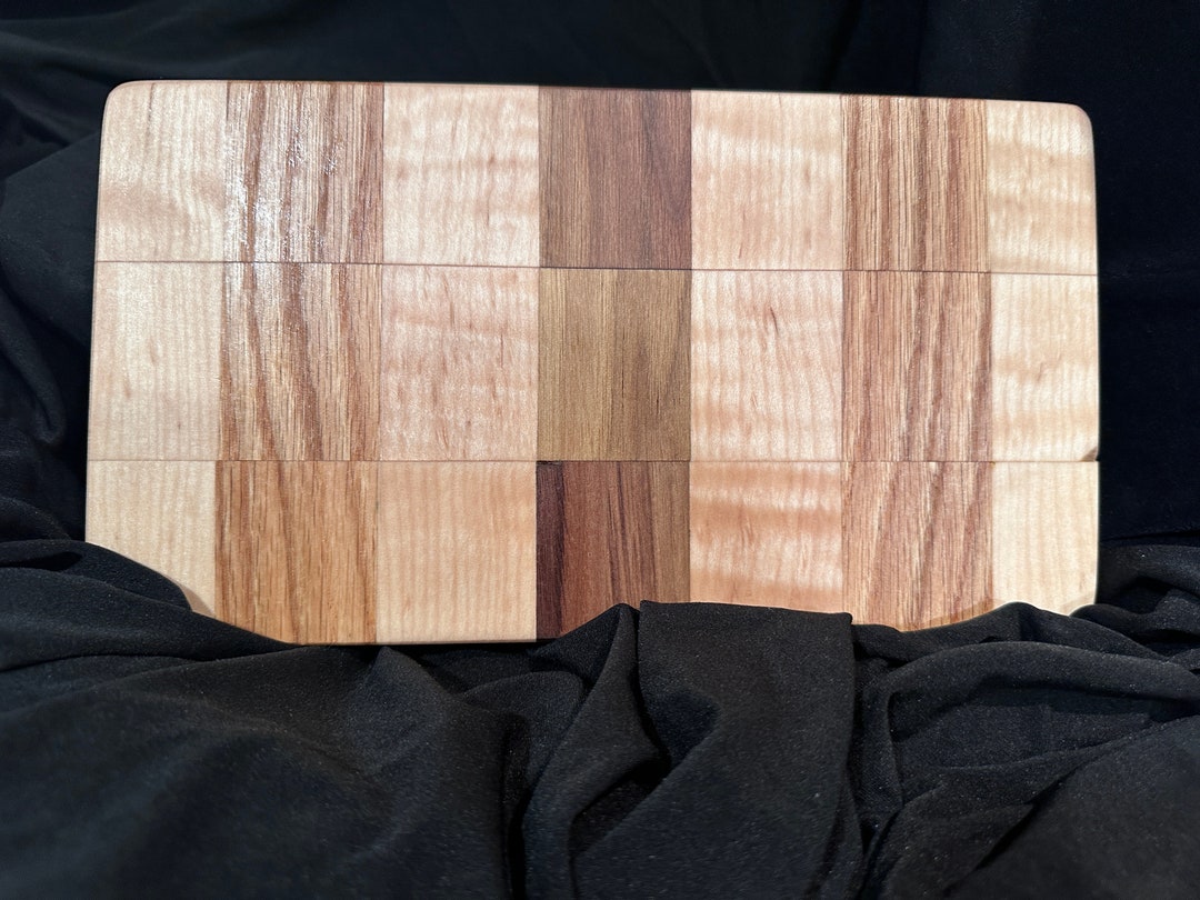 Custom Placeholders or Accent Pieces in Maple and Walnut Offer a Mix of ...