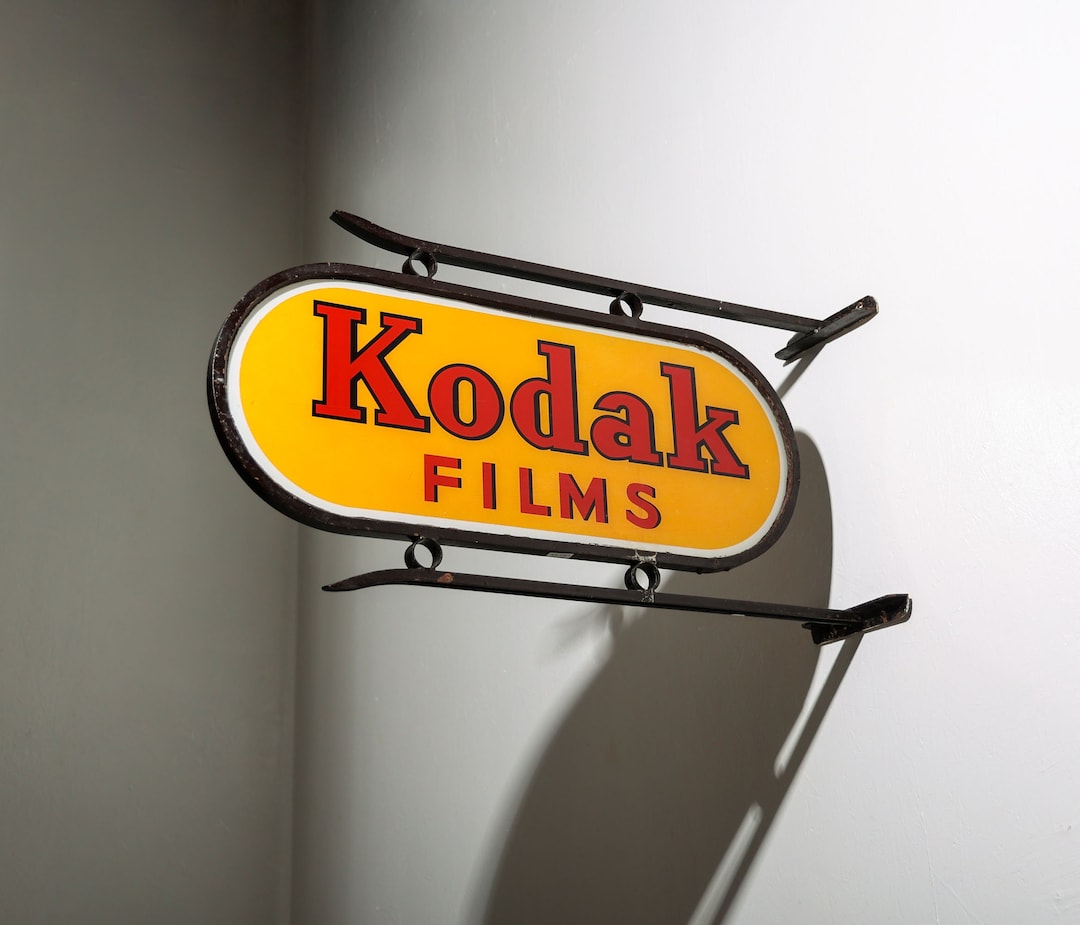 Kodak Films & Camera's, Double-sided Glass Sign, Mounted in Iron Frame ...