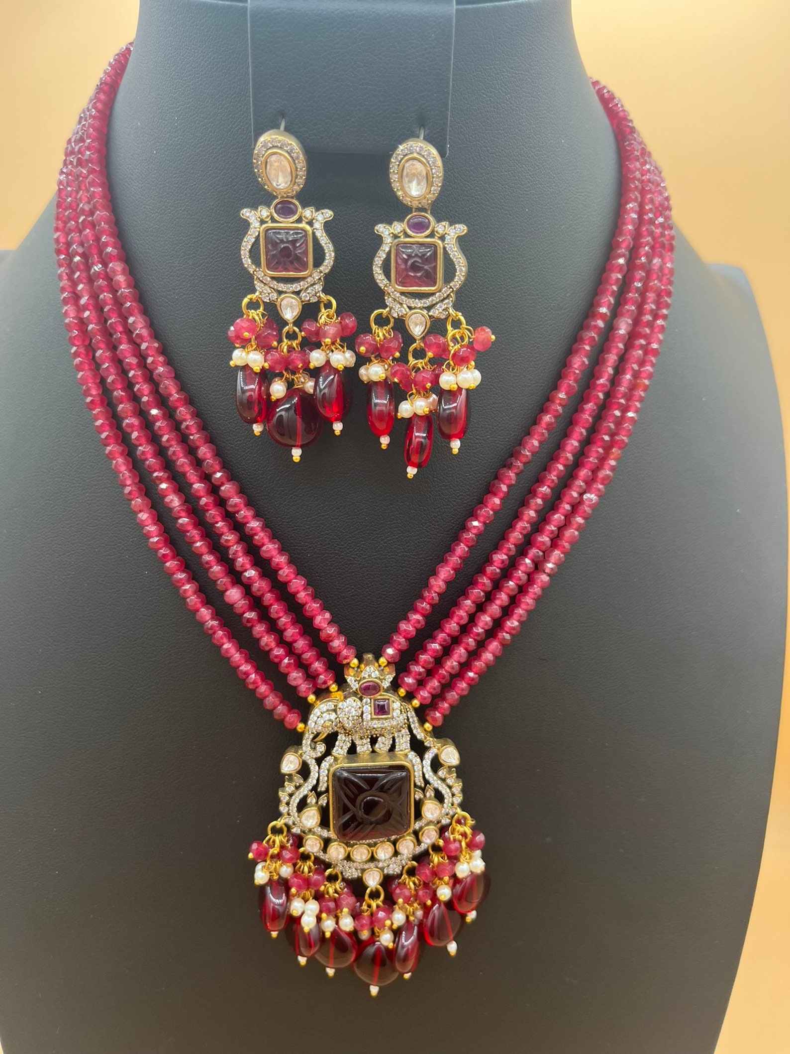 Trending Ruby Red Beads Necklace With Elephant Pendant and Beautiful ...