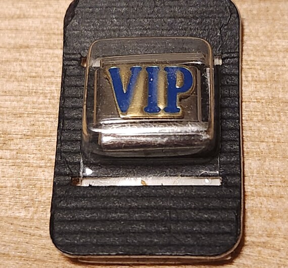 New word VIP in blue on gold background very importan… - Gem