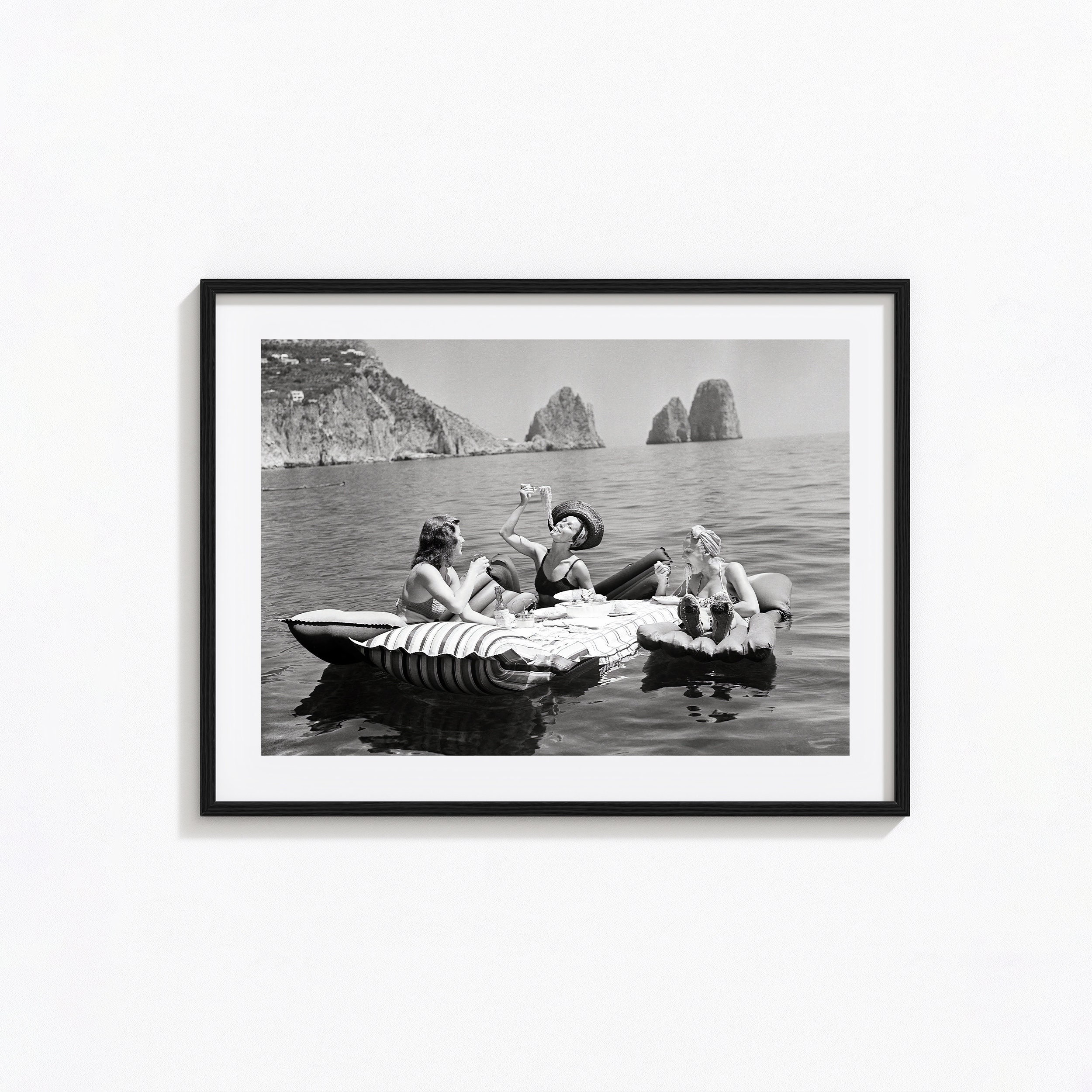 Floating Luncheon, Three Young Women Eat Spaghetti on Inflatable ...
