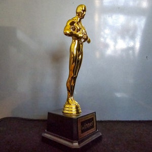 Winner Trophy Gold Man Statue | Symbol of Pride & Success Stories ...