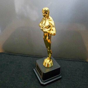 Winner Trophy Gold Man Statue | Symbol of Pride & Success Stories ...