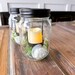 Set of Two Mason Jar LED Candle Lights With Green Foliage and White ...