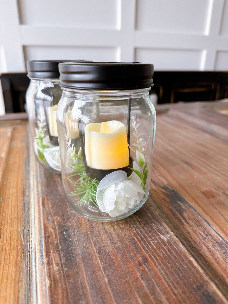Set of Two Mason Jar LED Candle Lights With Green Foliage and White ...