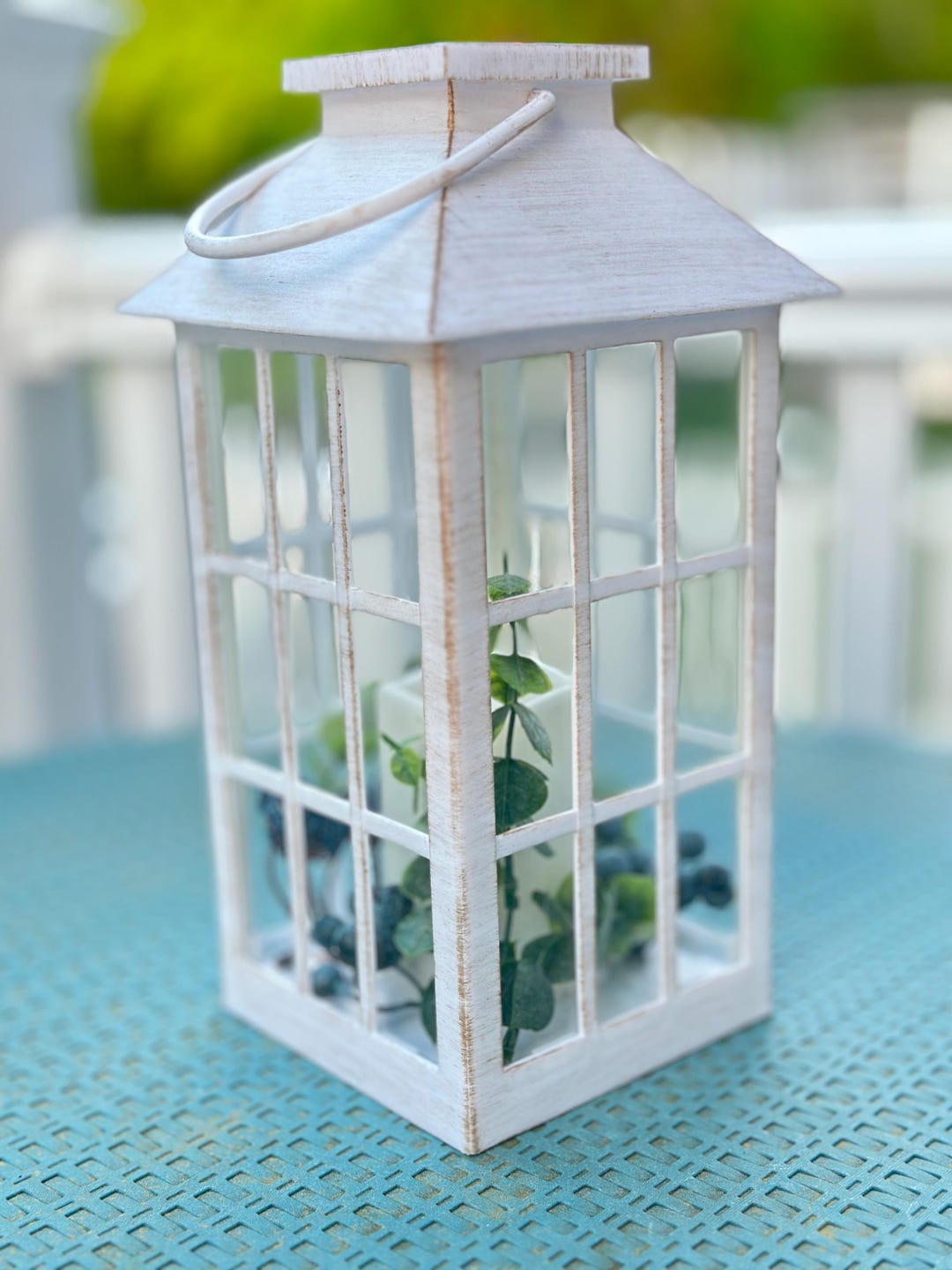 Solar Powered White Lantern With Faux Candle and Artificial Flowers ...