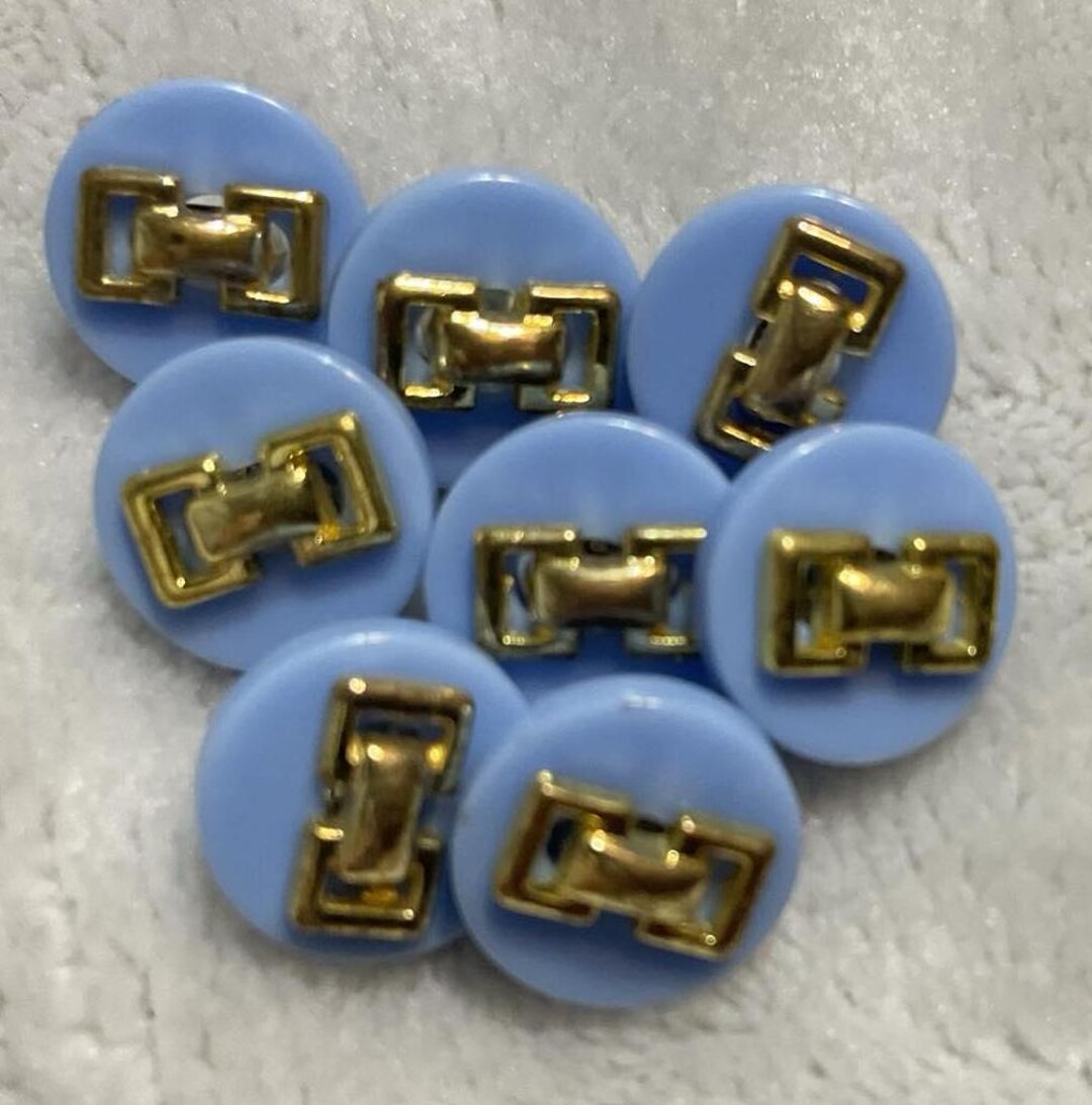7 Light Blue Plastic Buttons With Buckle Design. A Little Over 3/8 Inch ...