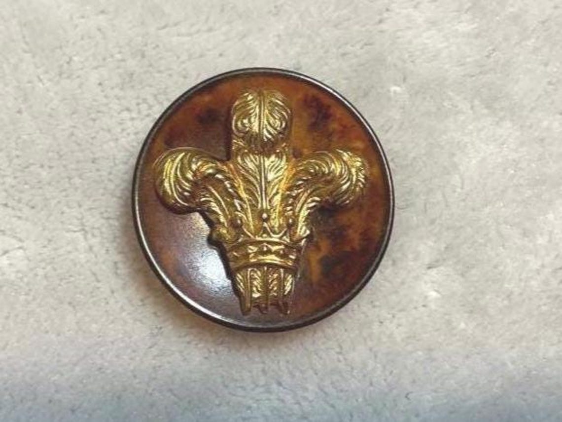 Concave Root Beer Bakelite Button With Metal Insert of Crown and ...