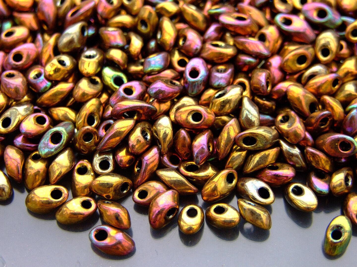 10g MIYUKI Long Magatama Japanese Beads 4x7mm Metallic Iris Gold Unique ...
