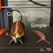3D Printed Articulated Slug Fidget Toy Rainbow and Many Colors and ...