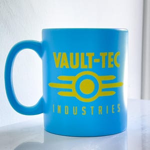 Vault Blue Mug | Tec Yellow Logo | Fictional Nuclear Fallout Prop ...