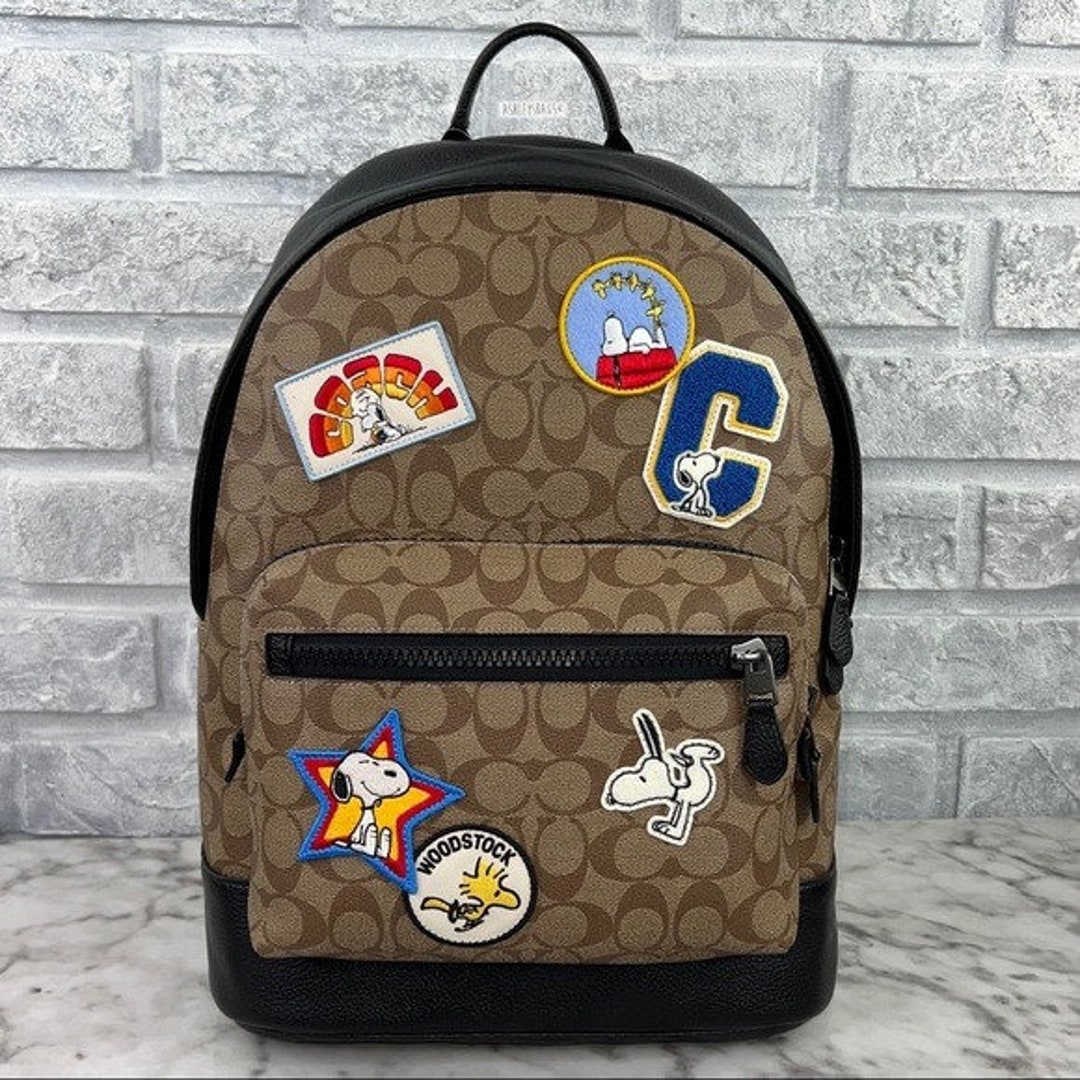 Coach X Peanuts Snoopy West Backpack in Signature Canvas With Varsity ...