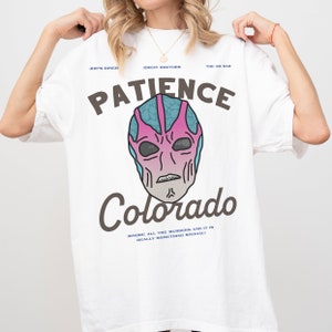 Patience, Colorado Graphic T-shirt, Funny Retro Alien UFO TV Show Merch ...
