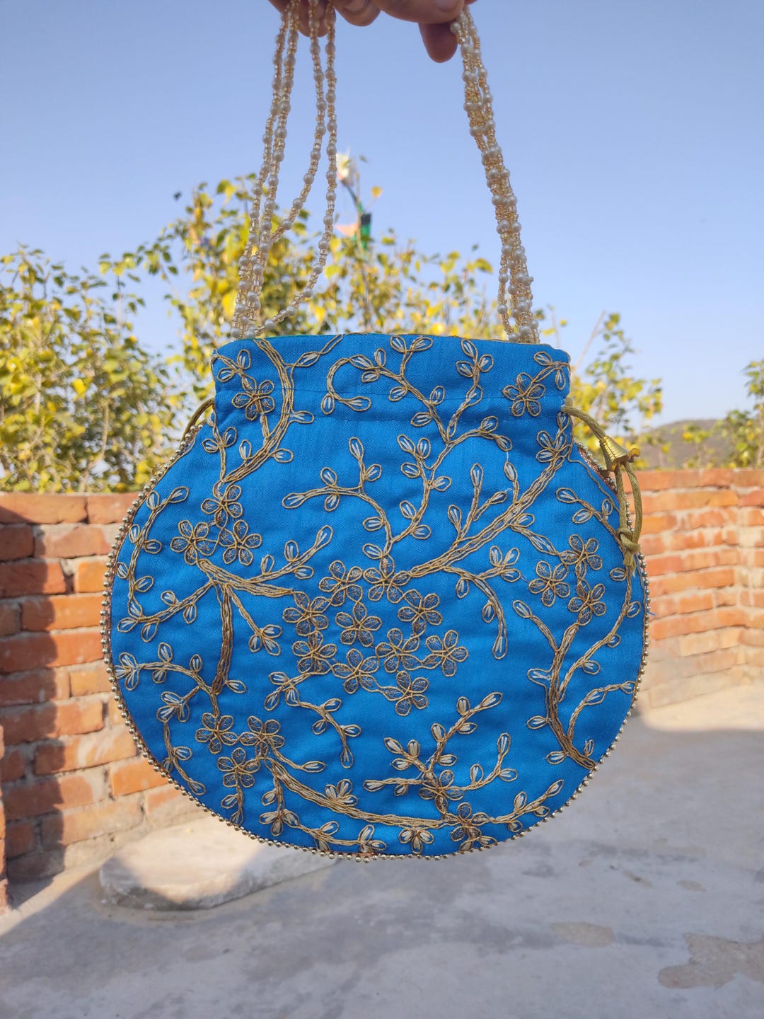 Sky Blue Handicrafts and Jewellery Women Potli Bags, Evening Handbags ...