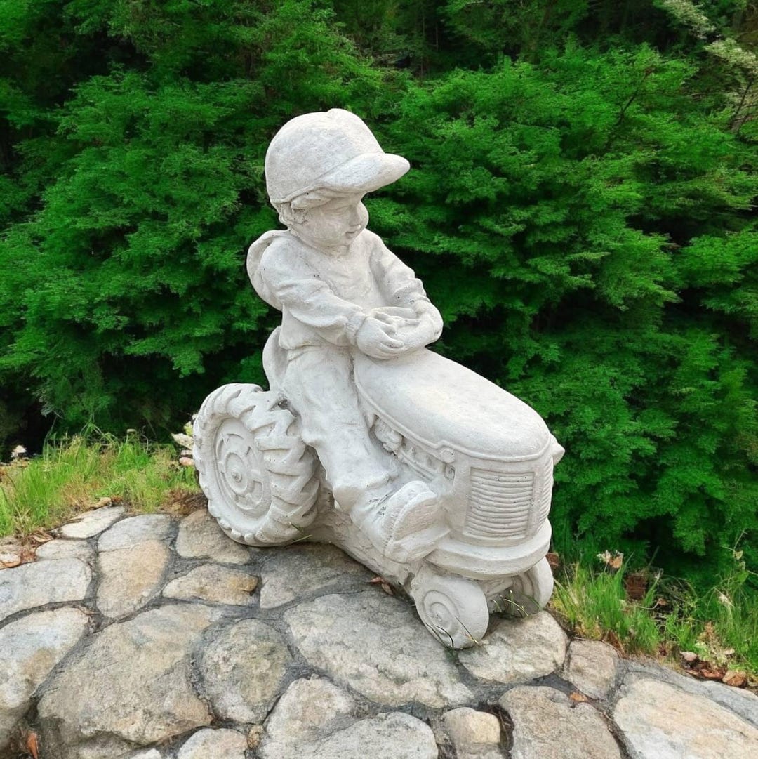 Young Child on a Tractor Figure Boy Driving Tractor Sculpure Concrete ...