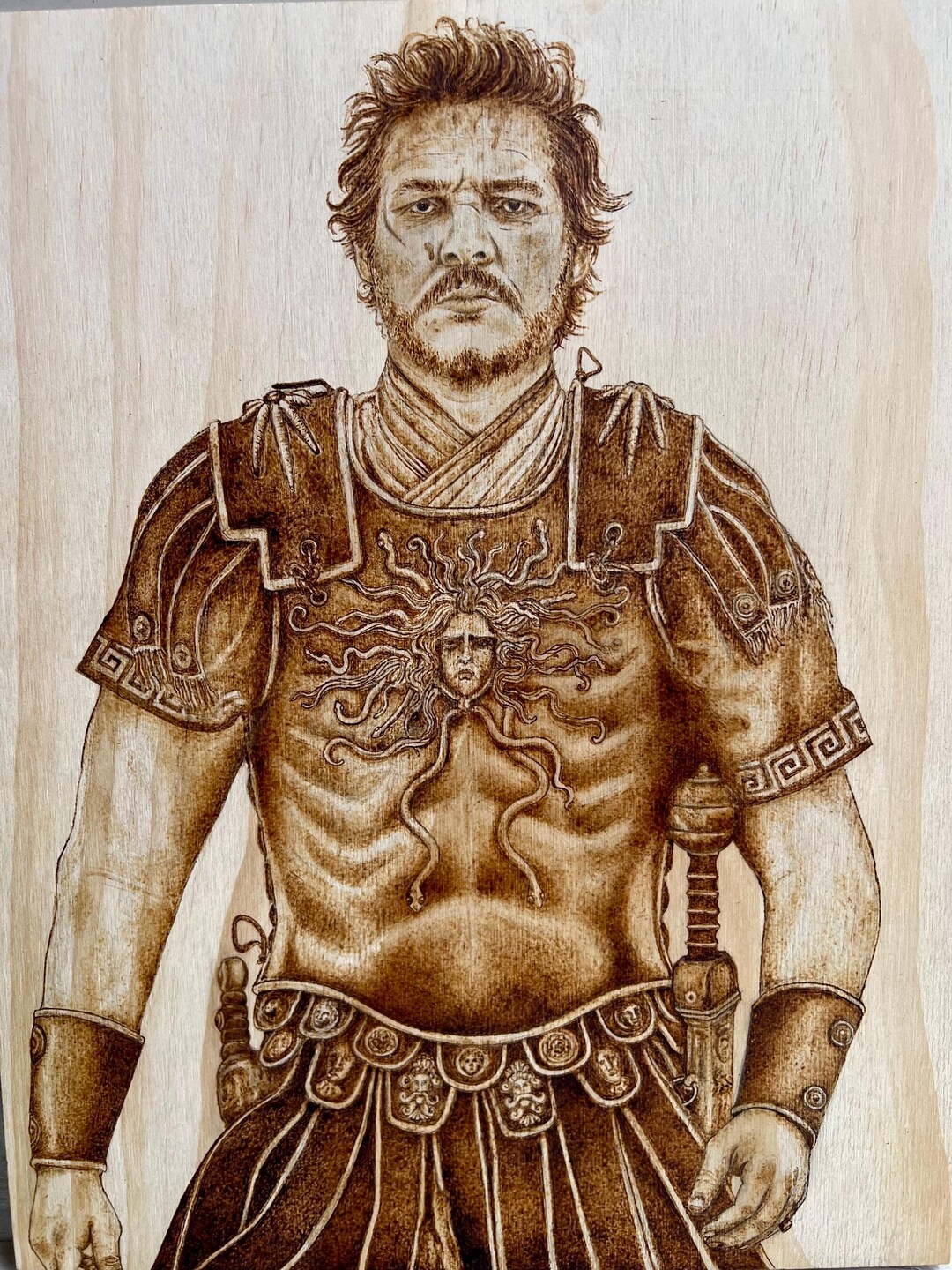 Wood-burned Portrait of Pedro Pascal as General Marcus Acacius ...