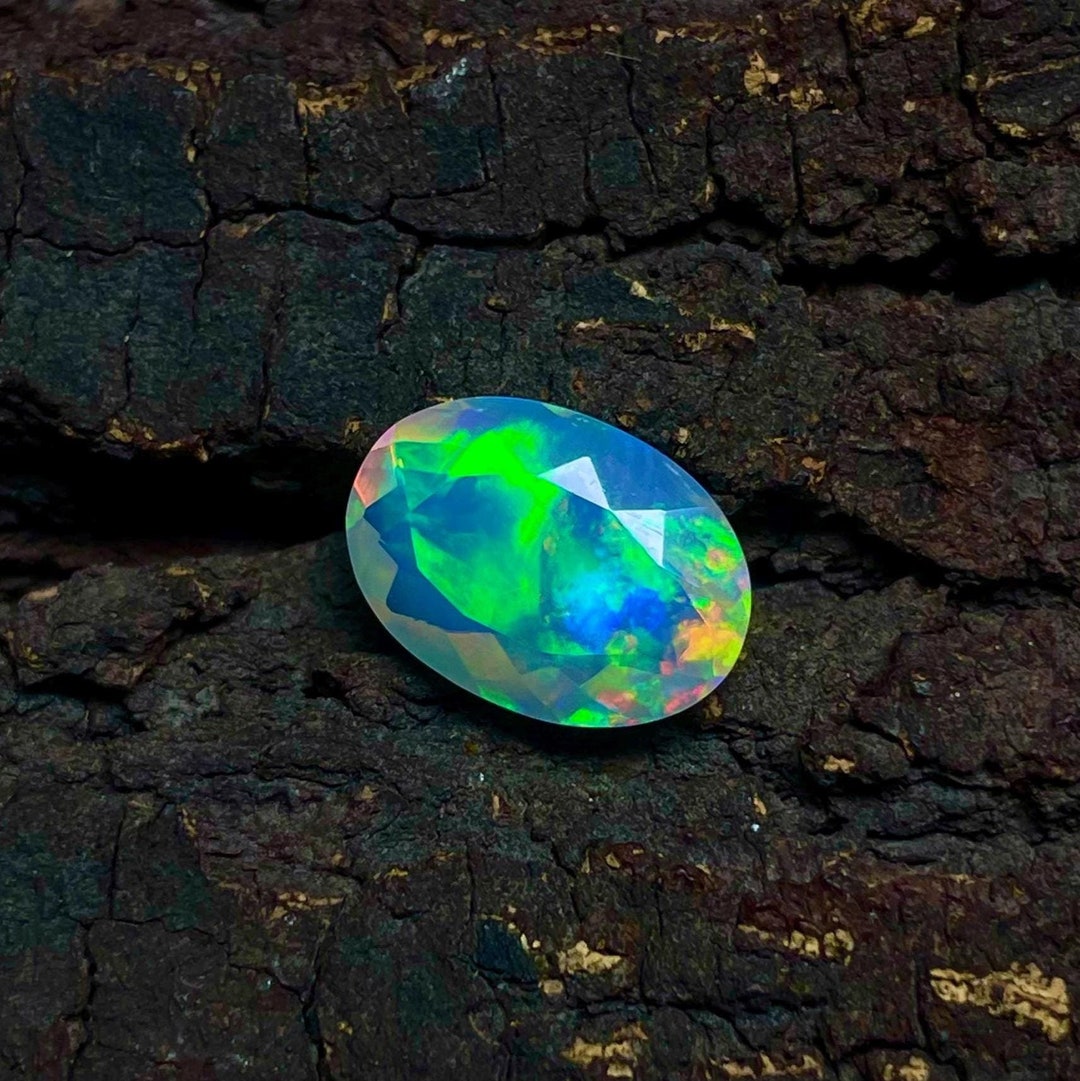 Faceted Ethiopian Opal: Multi Fire Oval Gemstone (14x10x6.55mm) - Etsy