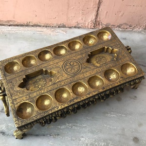 Traditional South Indian Game Pallanguzhi, Brass Board With Wheels ...