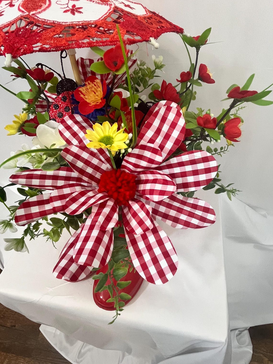 Joyful Blossoms: Vibrant Floral Display in Red Rain Boots - Etsy