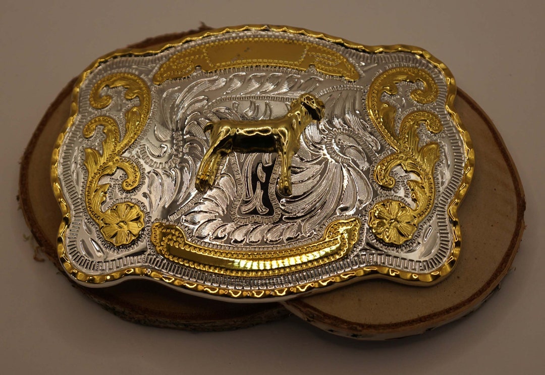 Belt Buckle of a Gold-colored Goat on a Silver-colored Decorative ...
