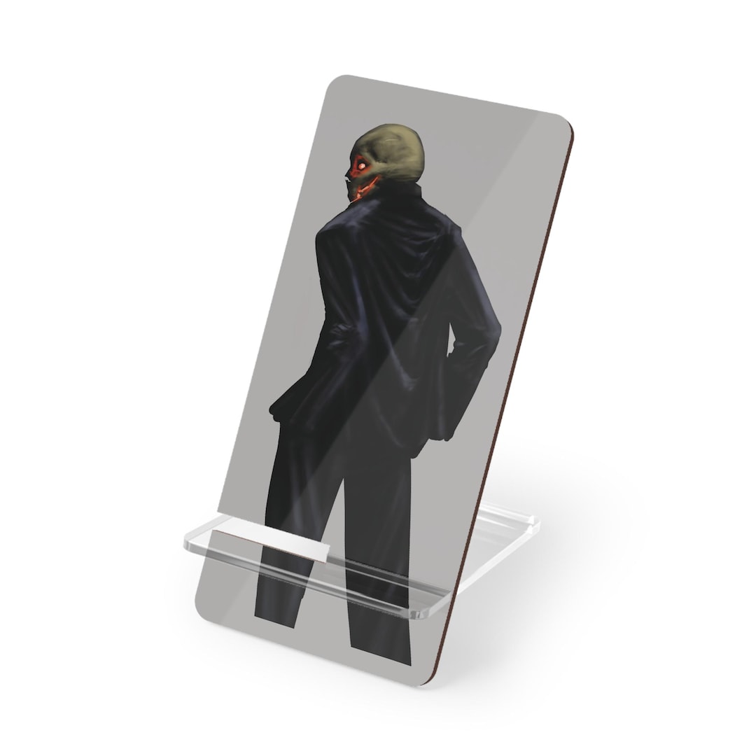 Gloomy Skeleton Skull Phone Stand - Moody Working Man Phone Holder ...