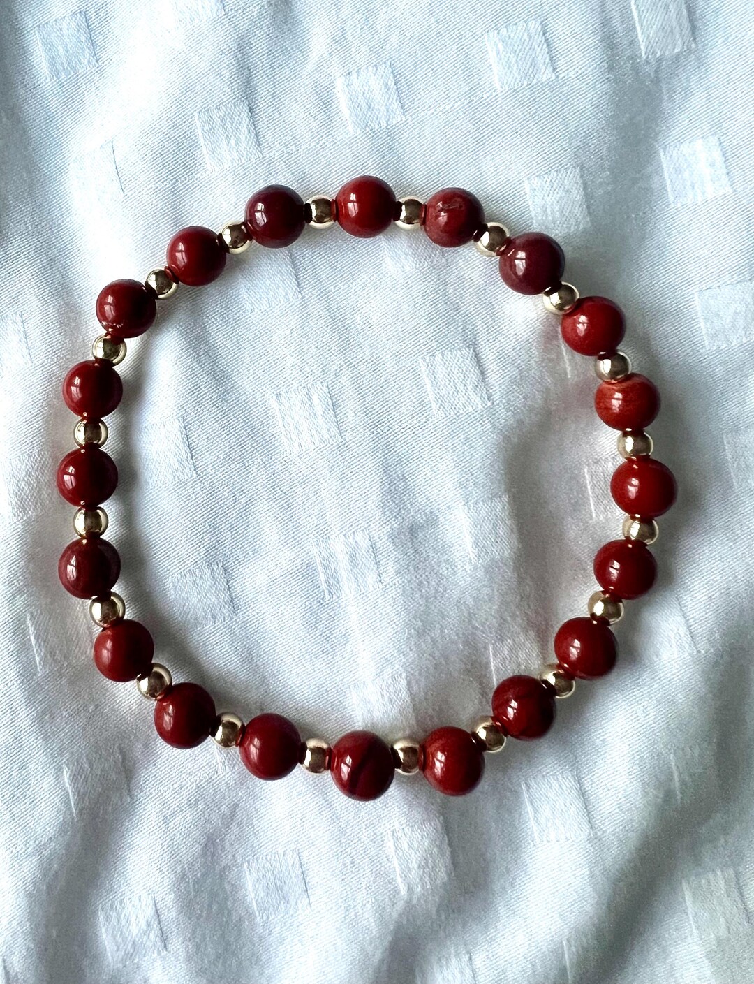 The JUSTICE Handmade Beaded Stretch Bracelet is Made From Red Jasper ...