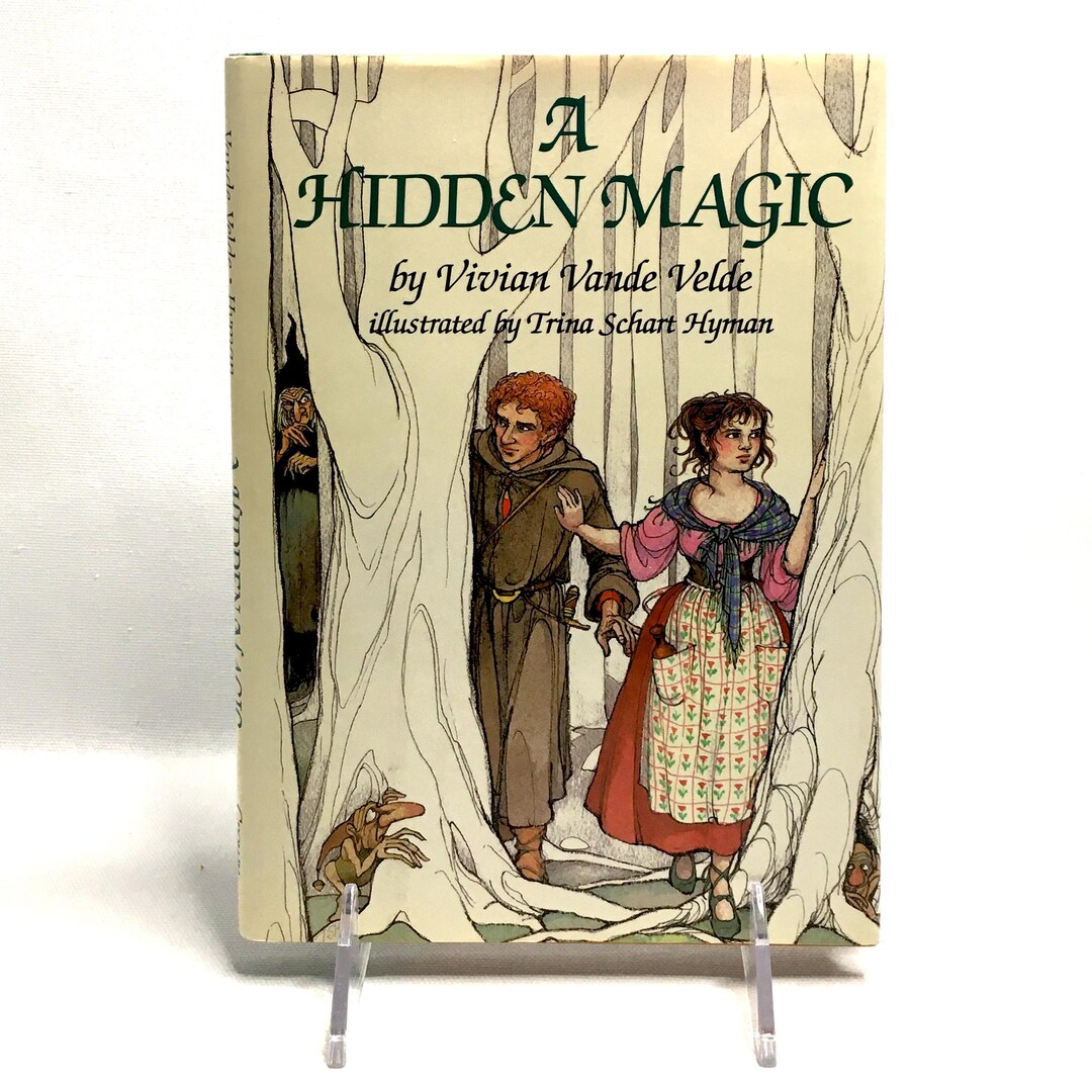A Hidden Magic • by Vivian Vande Velde • Illustrated by Trina Schart ...