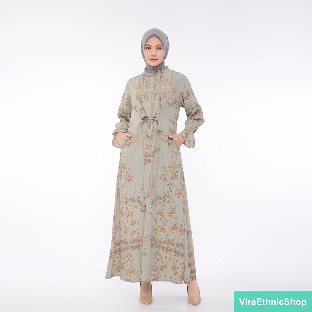 Classy Appearance With the Laiqa Sage Dress: Inspiration From London ...