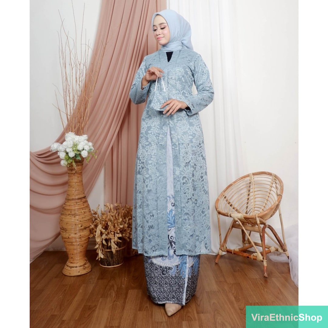The Beauty of Brocade in a Kebaya Tunic Suit: Look Charming at Parties ...