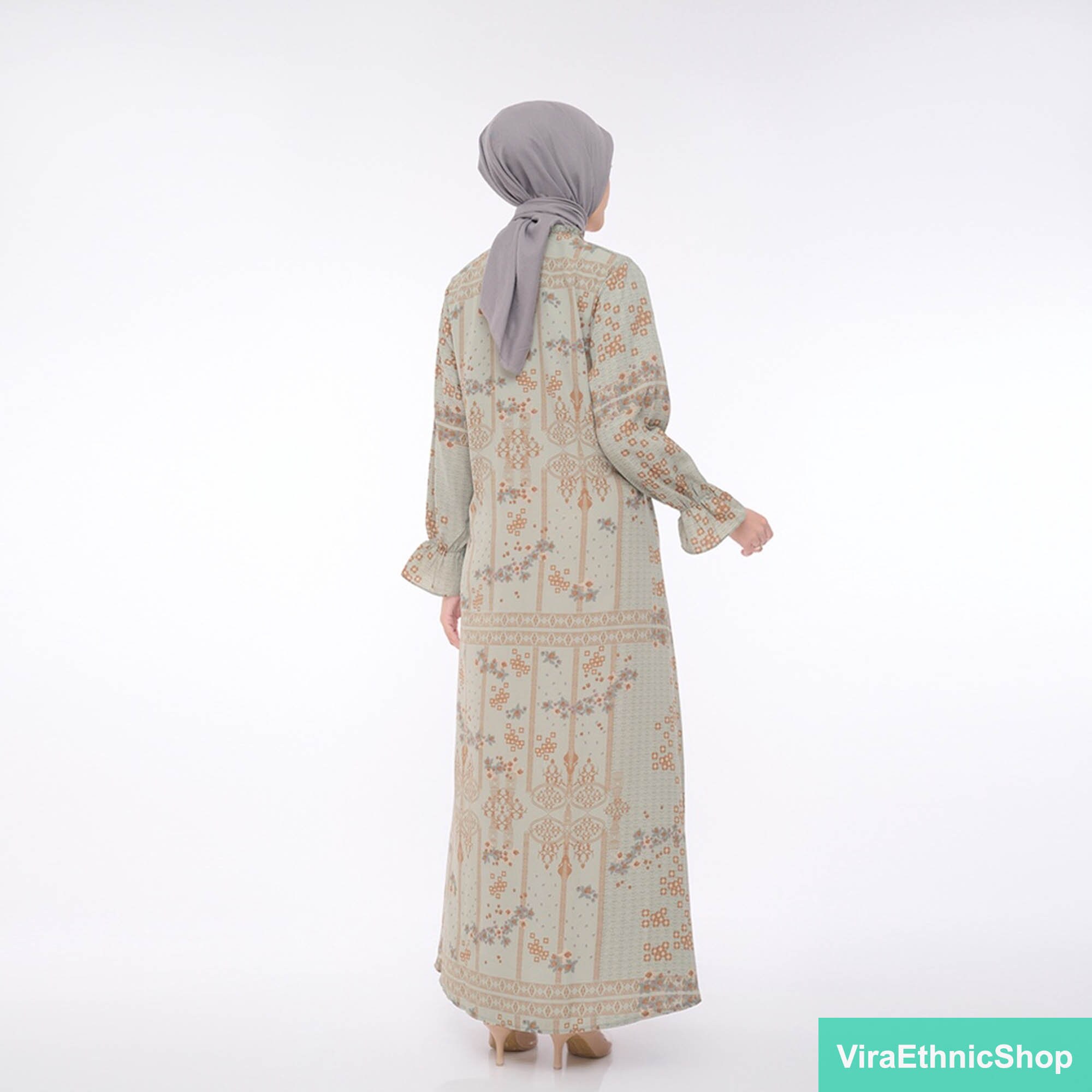 Classy Appearance With the Laiqa Sage Dress: Inspiration From London ...