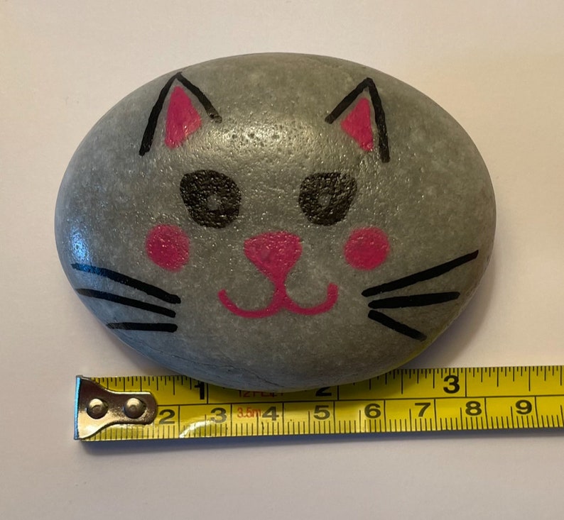 Smiling Kitty Hand Painted on Rock With Acrylic Paint. Paw Prints on ...