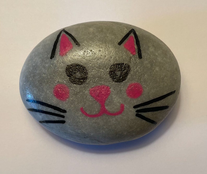 Smiling Kitty Hand Painted on Rock With Acrylic Paint. Paw Prints on ...