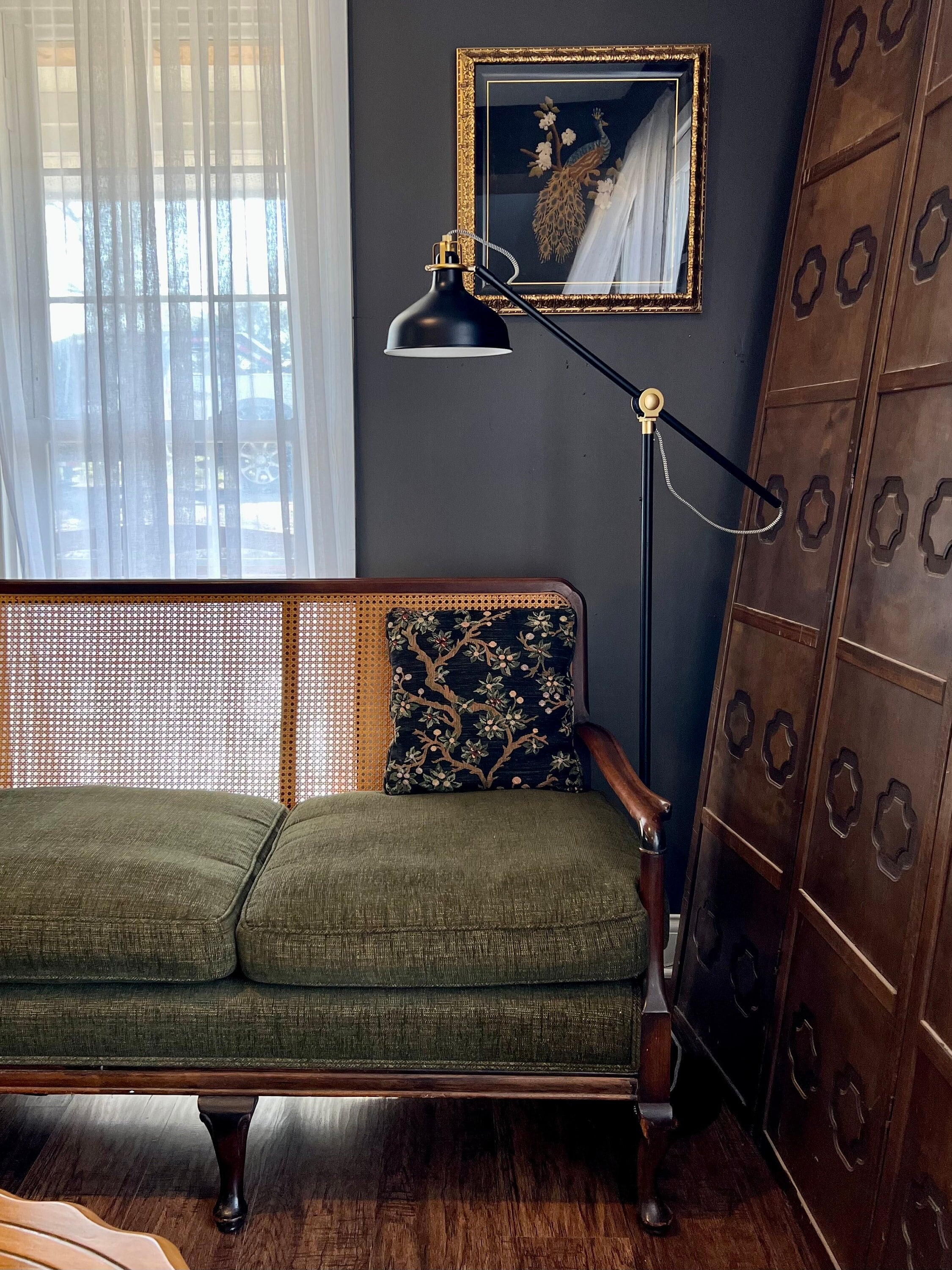Cane back sofa antique store